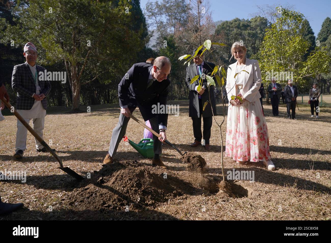 The Duke and Duchess of Edinburgh plant a Magnolia tree, beside a tree ...