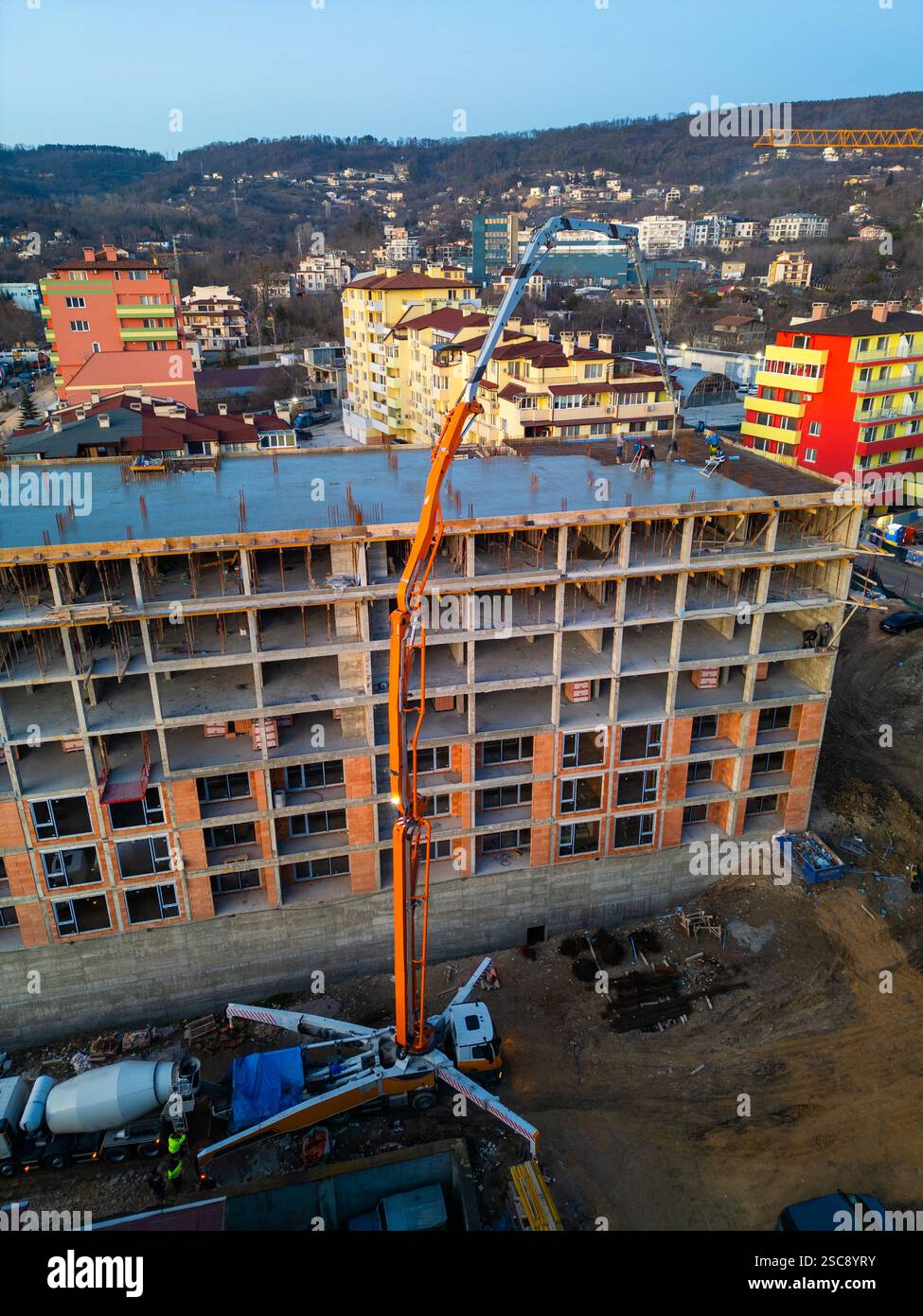 Aerial view of a construction site with a high-rise building under ...