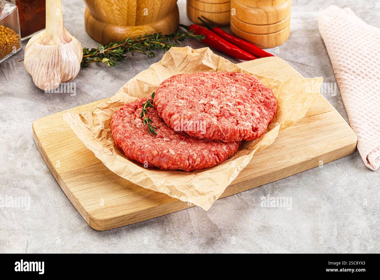 Raw beef minced meat cutlet for grill Stock Photo - Alamy