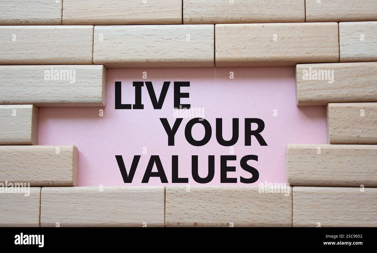 Live your values symbol. Concept words Live your values on wooden ...