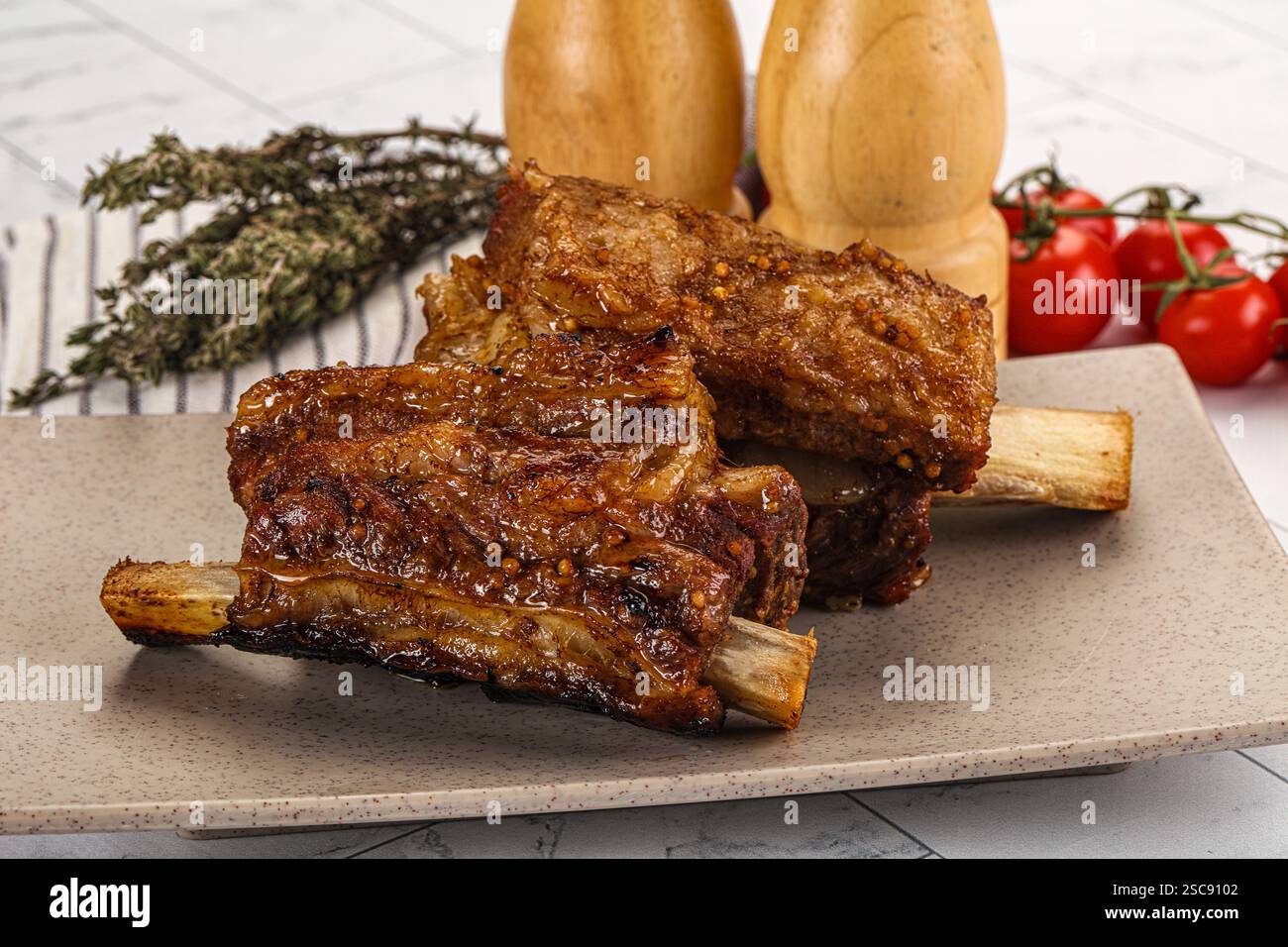 Baked beef ribs with marinade with seasoning Stock Photo - Alamy