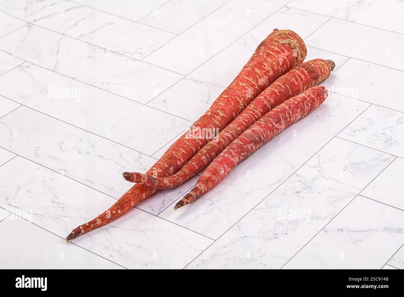 Red Indian raw carrot vegetable root Stock Photo - Alamy