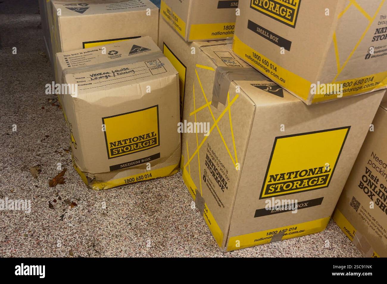 Sunken cardboard boxes are seen after floodwaters inundated a garage in ...