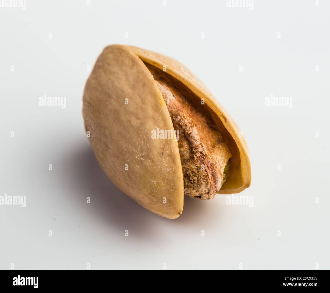 The dry pistachio on the white background Stock Photo - Alamy