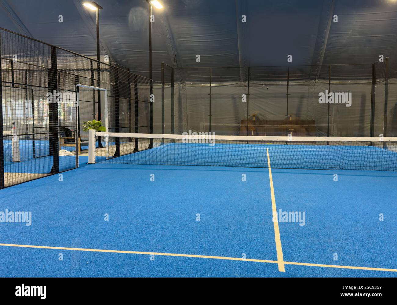 Padel court with lines and net indoor Stock Photo - Alamy