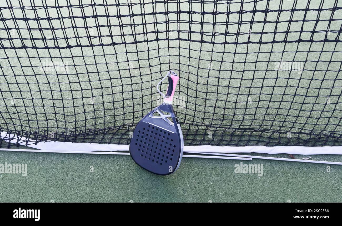 Paddle tennis racket and ball image at outdoors court Stock Photo - Alamy