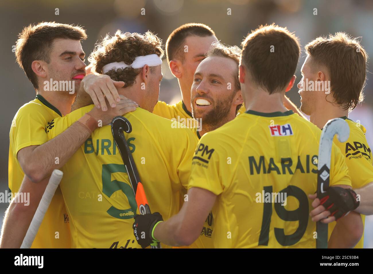 Cooper Burns of Australia celebrates with team mates after scoring a ...
