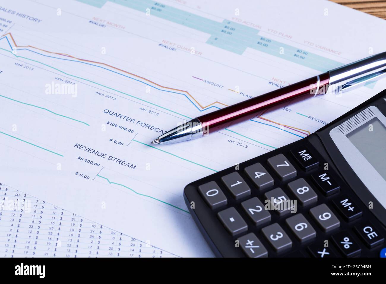 Graphs and Calculator Stock Photo - Alamy
