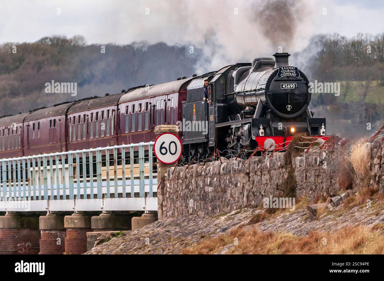 Restored steam engine Leander crossing the Arnside viaduct over the ...