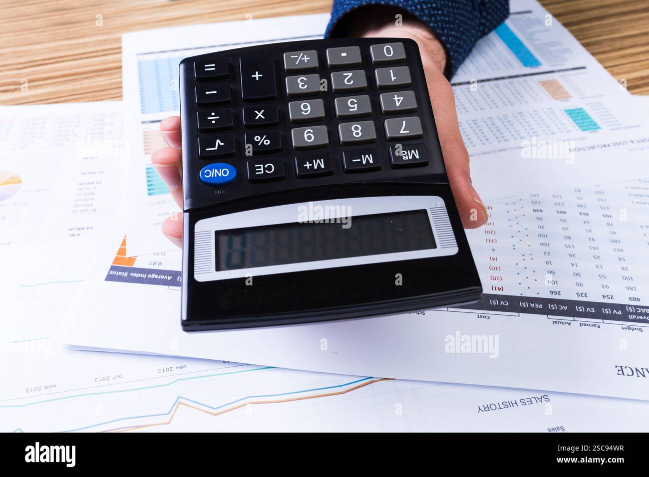 Graphs and Calculator Stock Photo - Alamy