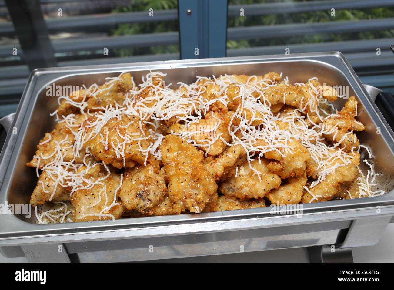 Fried Fish Pieces in Tray Stock Photo - Alamy