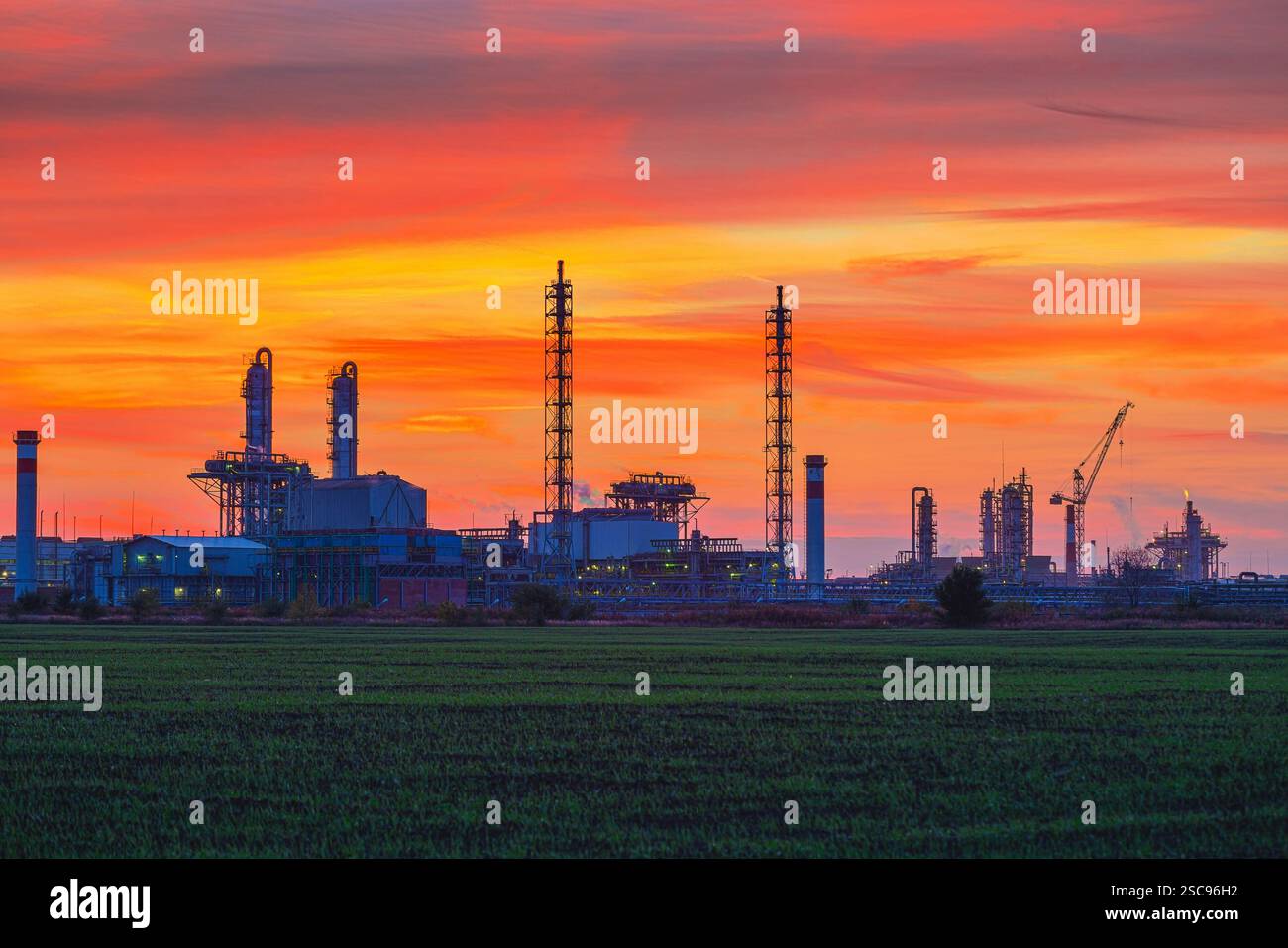 Panorama of Oil refinery factory over sunriseм Stock Photo - Alamy