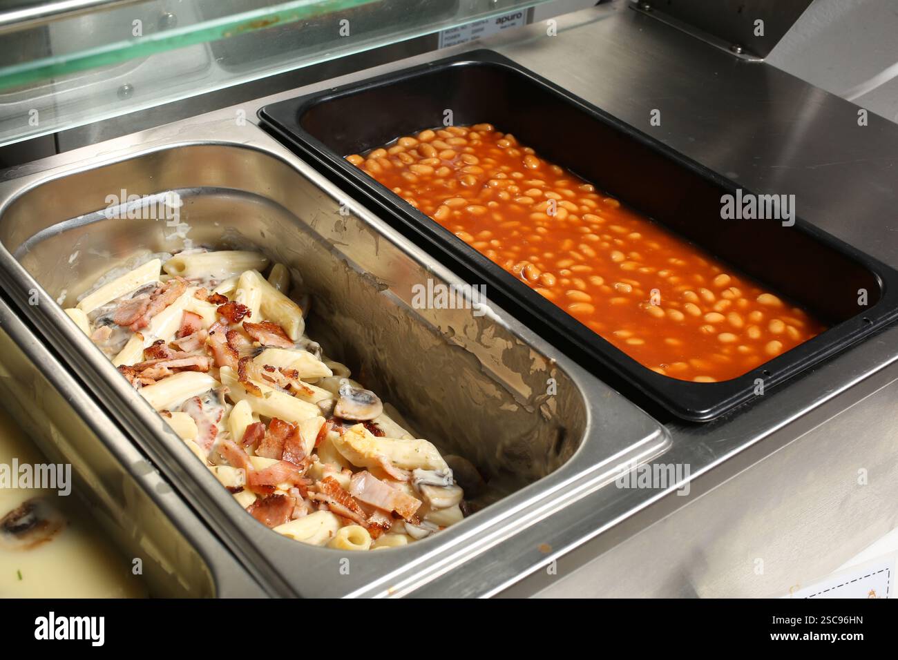 Buffet-style Baked Beans and Creamy Penne Stock Photo - Alamy