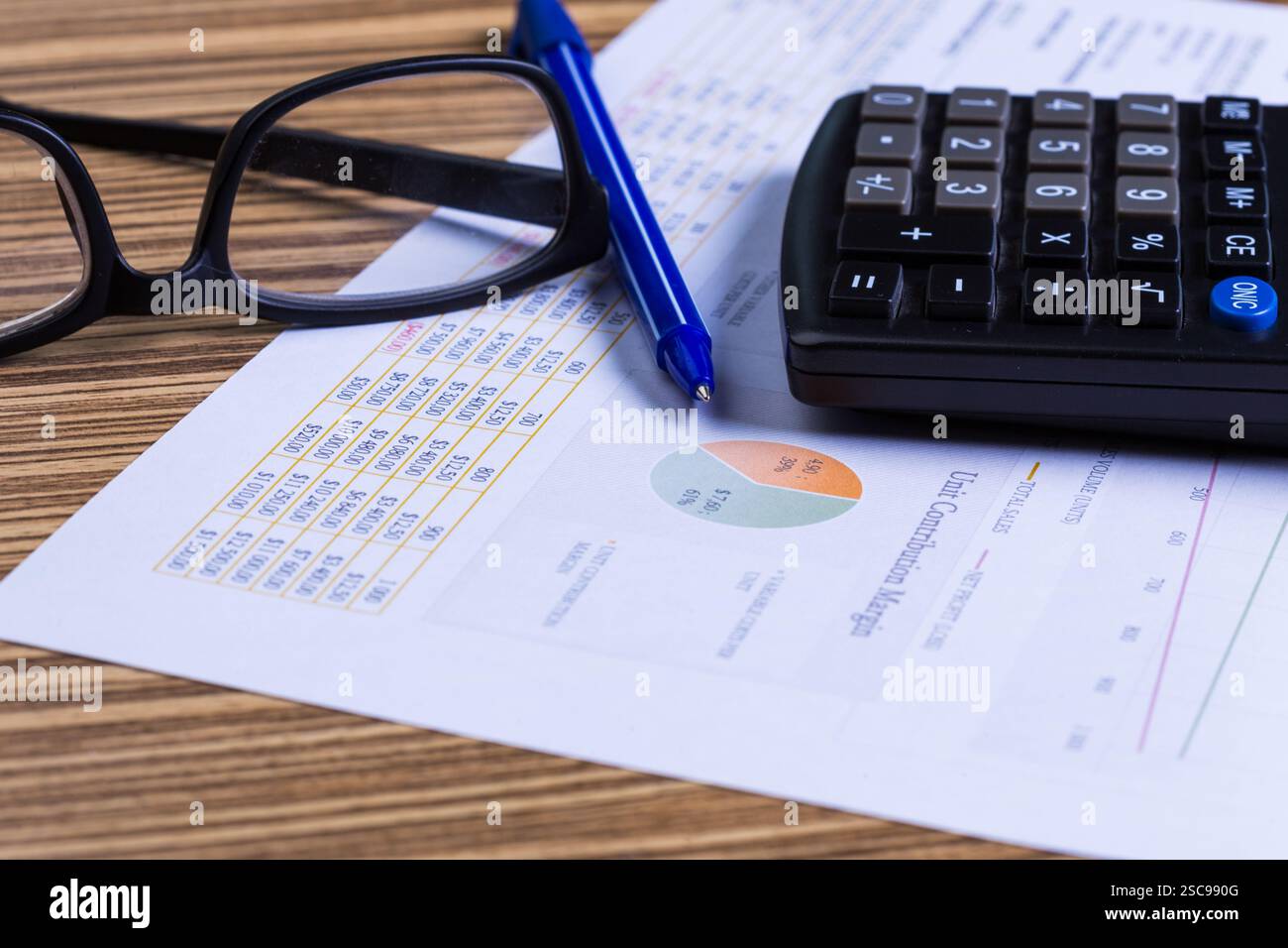 Graphs and Calculator Stock Photo - Alamy