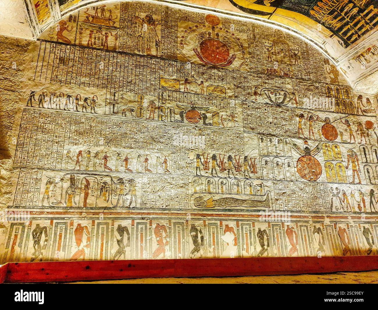 Detailed wall relief with scenes from the Book of the Earth,bound and ...