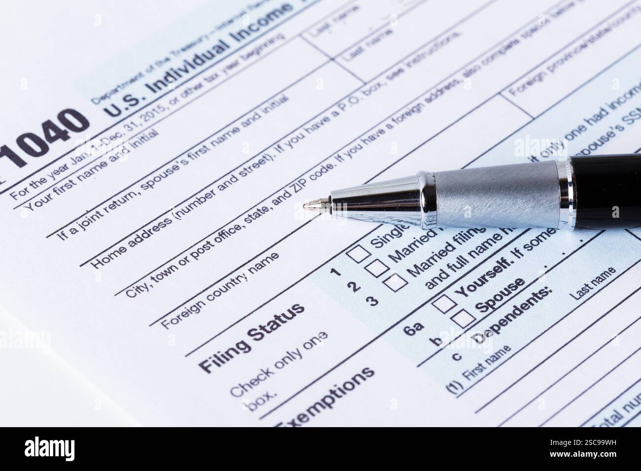Income tax form and pen Stock Photo - Alamy