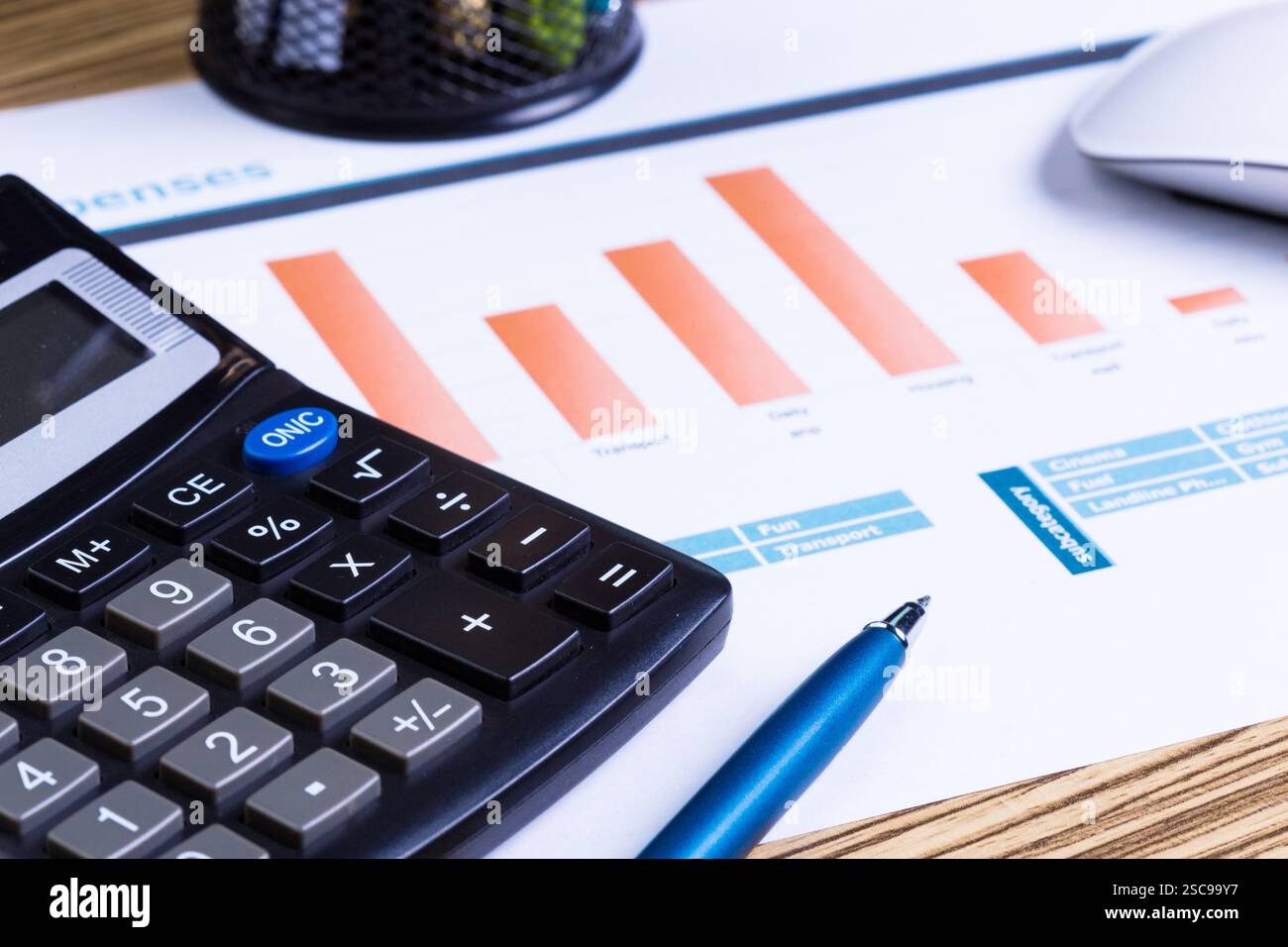 Graphs and Calculator Stock Photo - Alamy