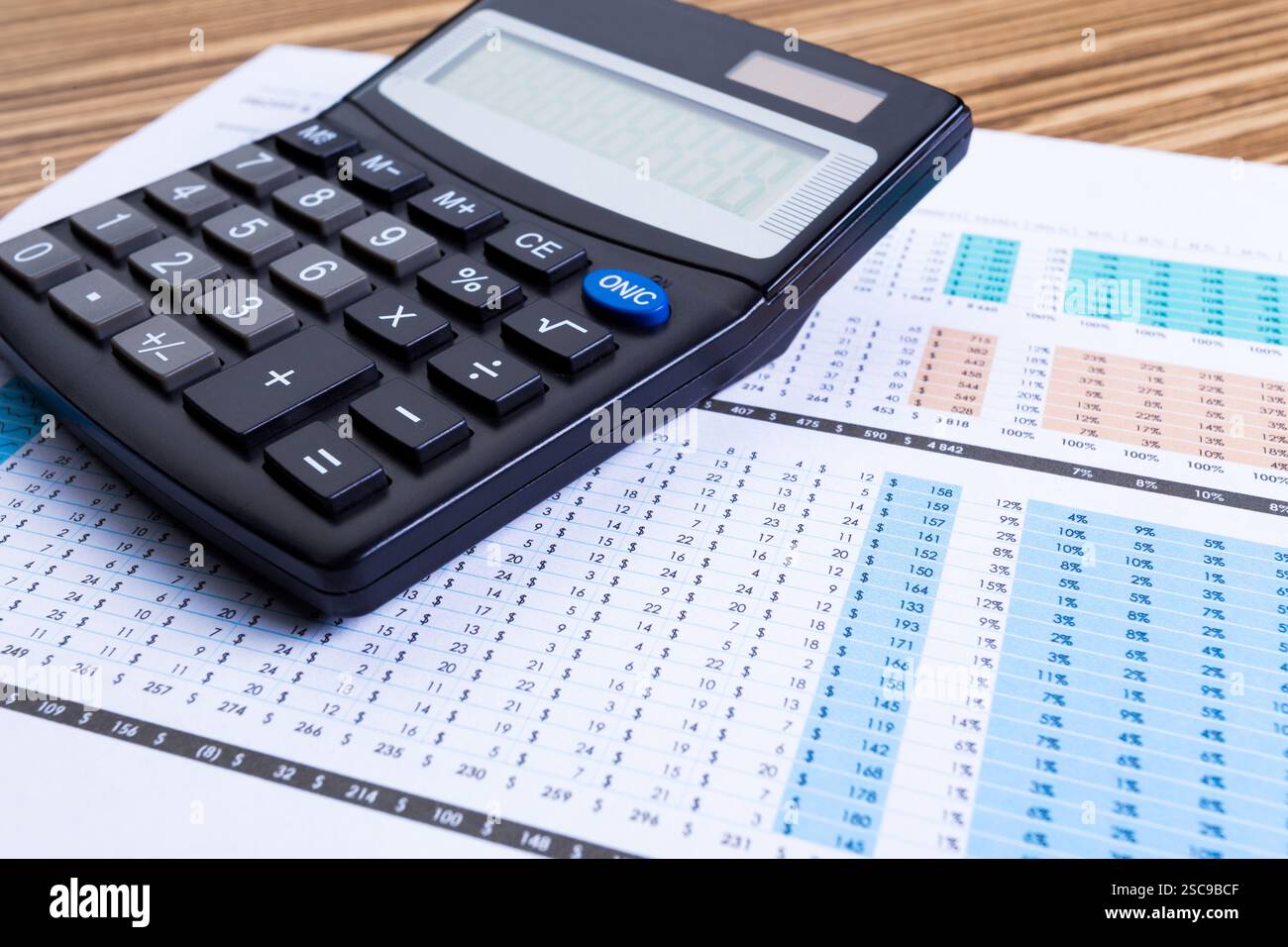 Graphs and Calculator Stock Photo - Alamy