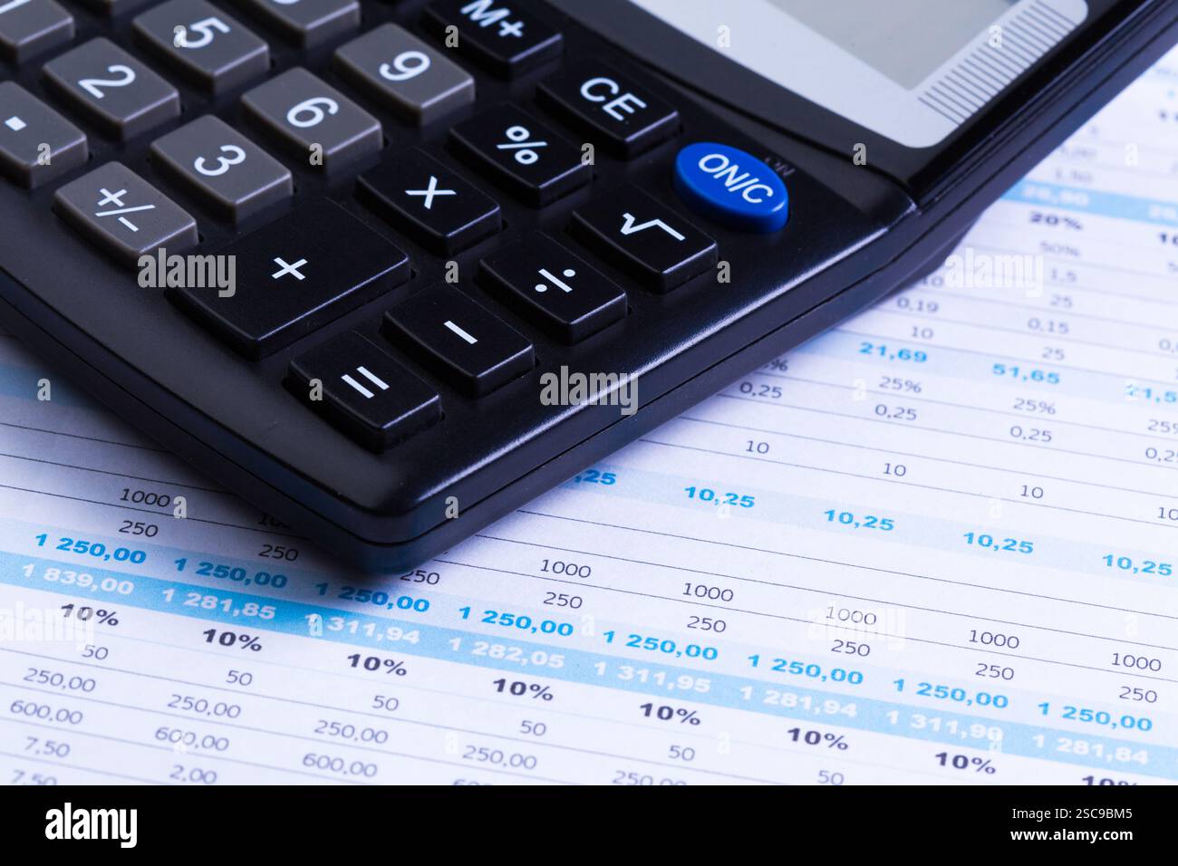 Graphs and Calculator Stock Photo - Alamy