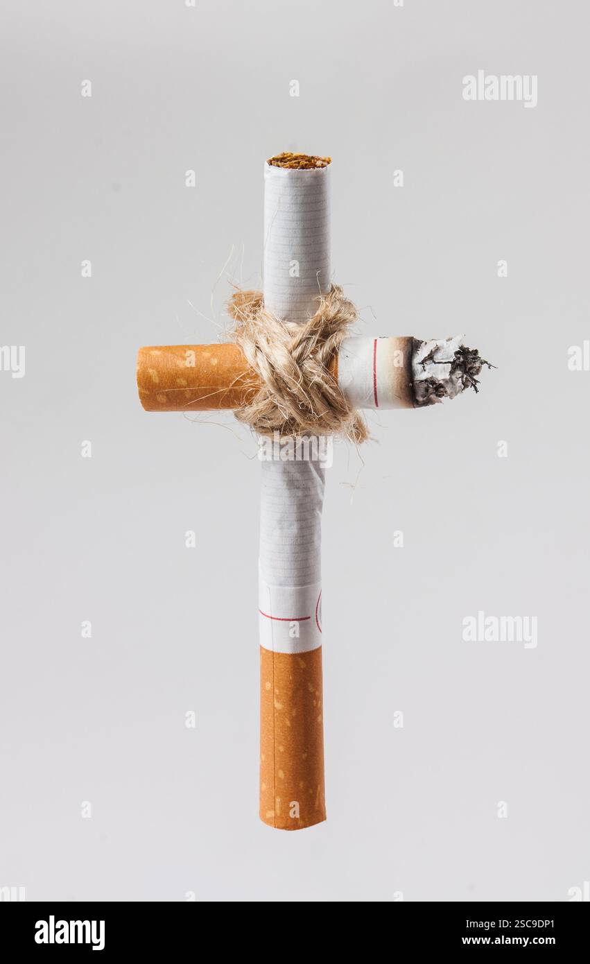 Cigarettes cross on grave hi-res stock photography and images - Alamy