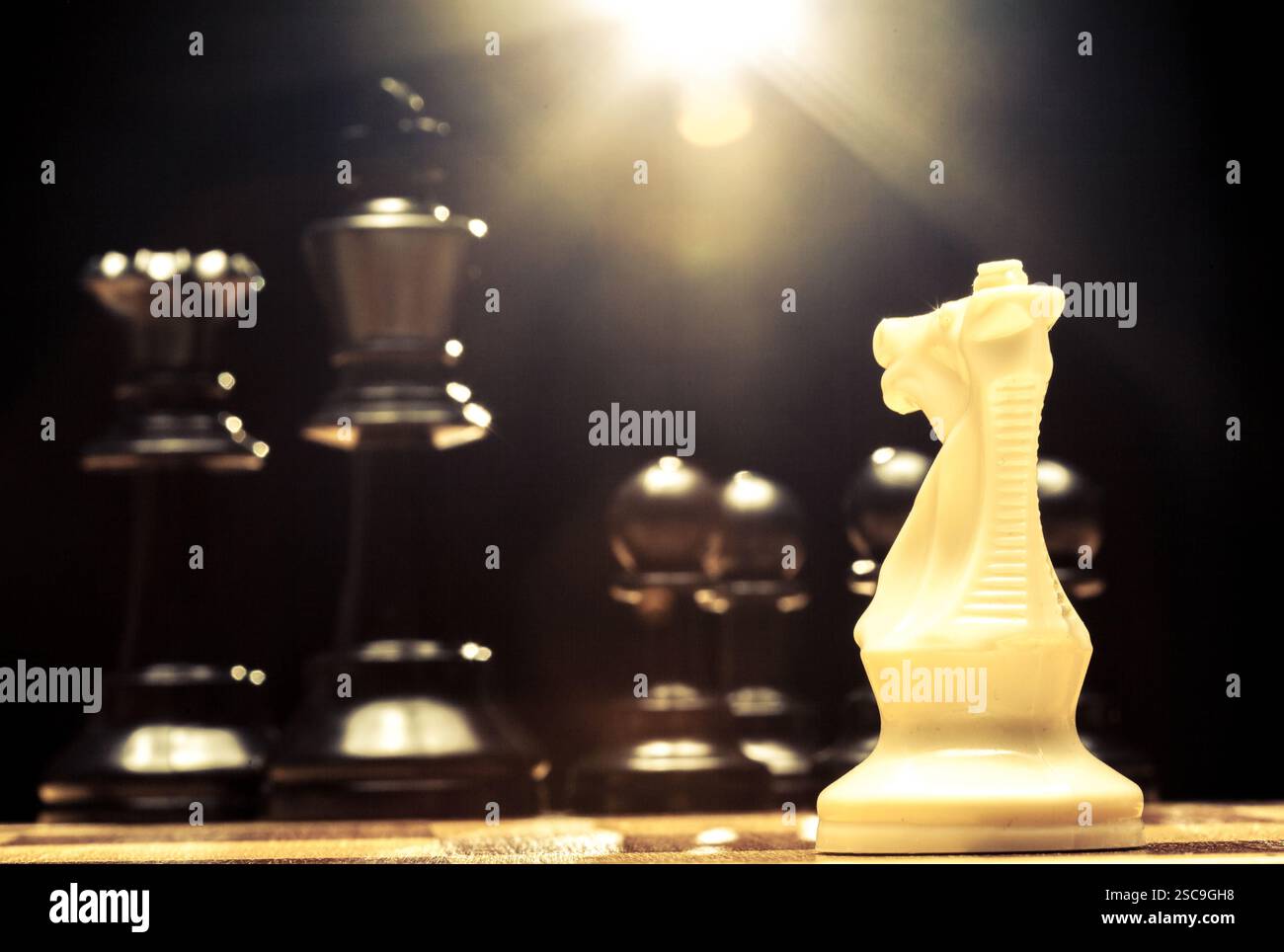chess pieces on a black background Stock Photo - Alamy