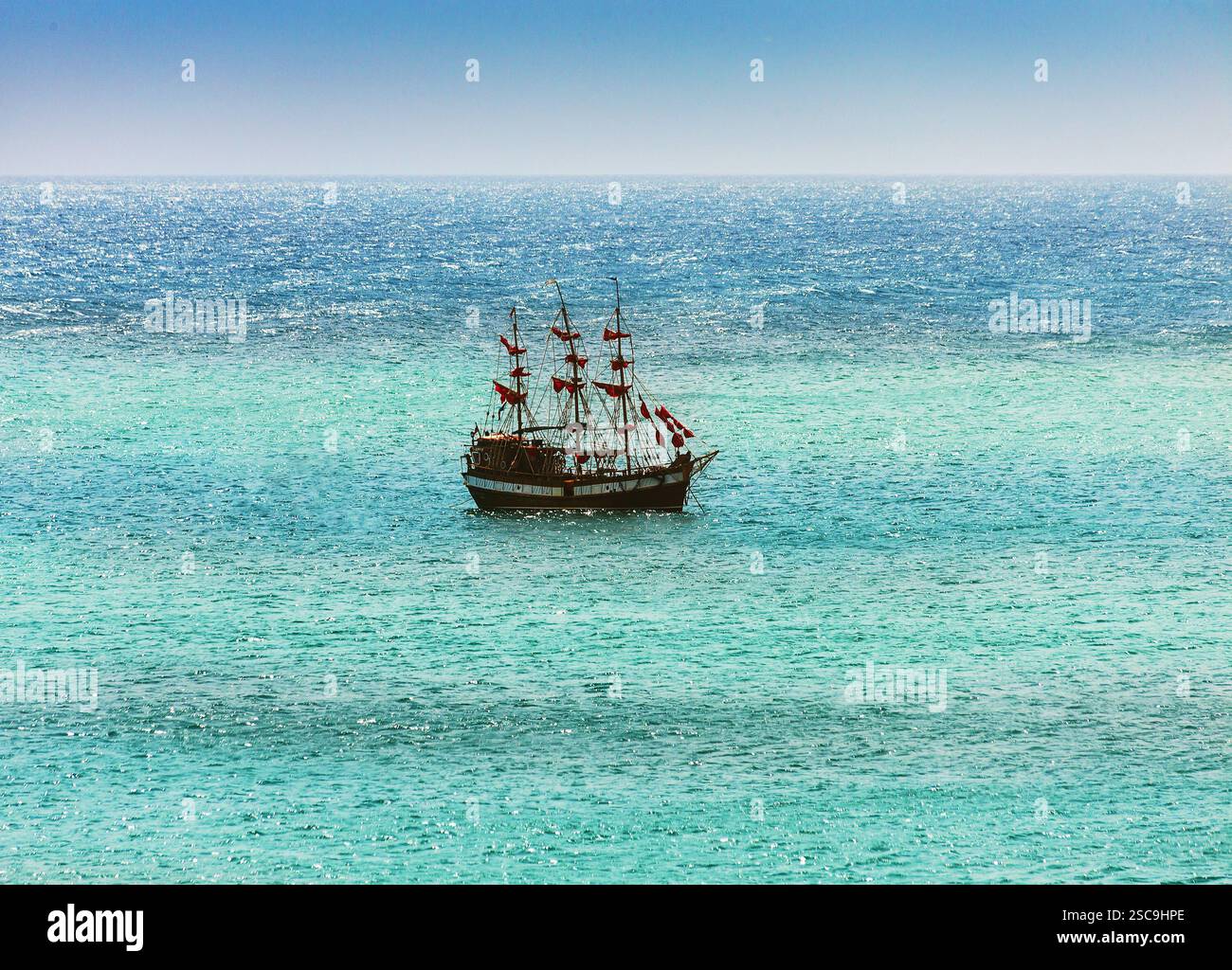 Old ship with sails, sailing in the sea Stock Photo - Alamy