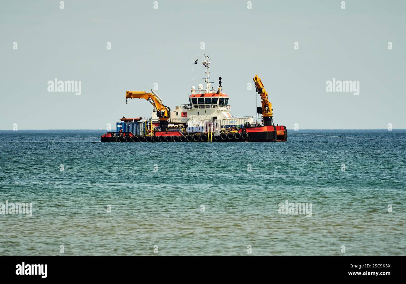 Waddenstroom dredger/cable layer working inshore at Marske, North ...