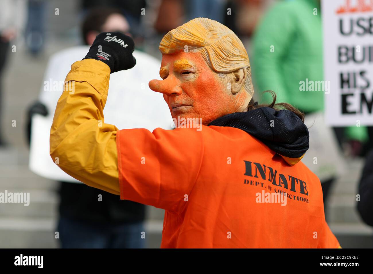 Harrisburg, United States. 05th Feb, 2025. A protester wears a Trump ...