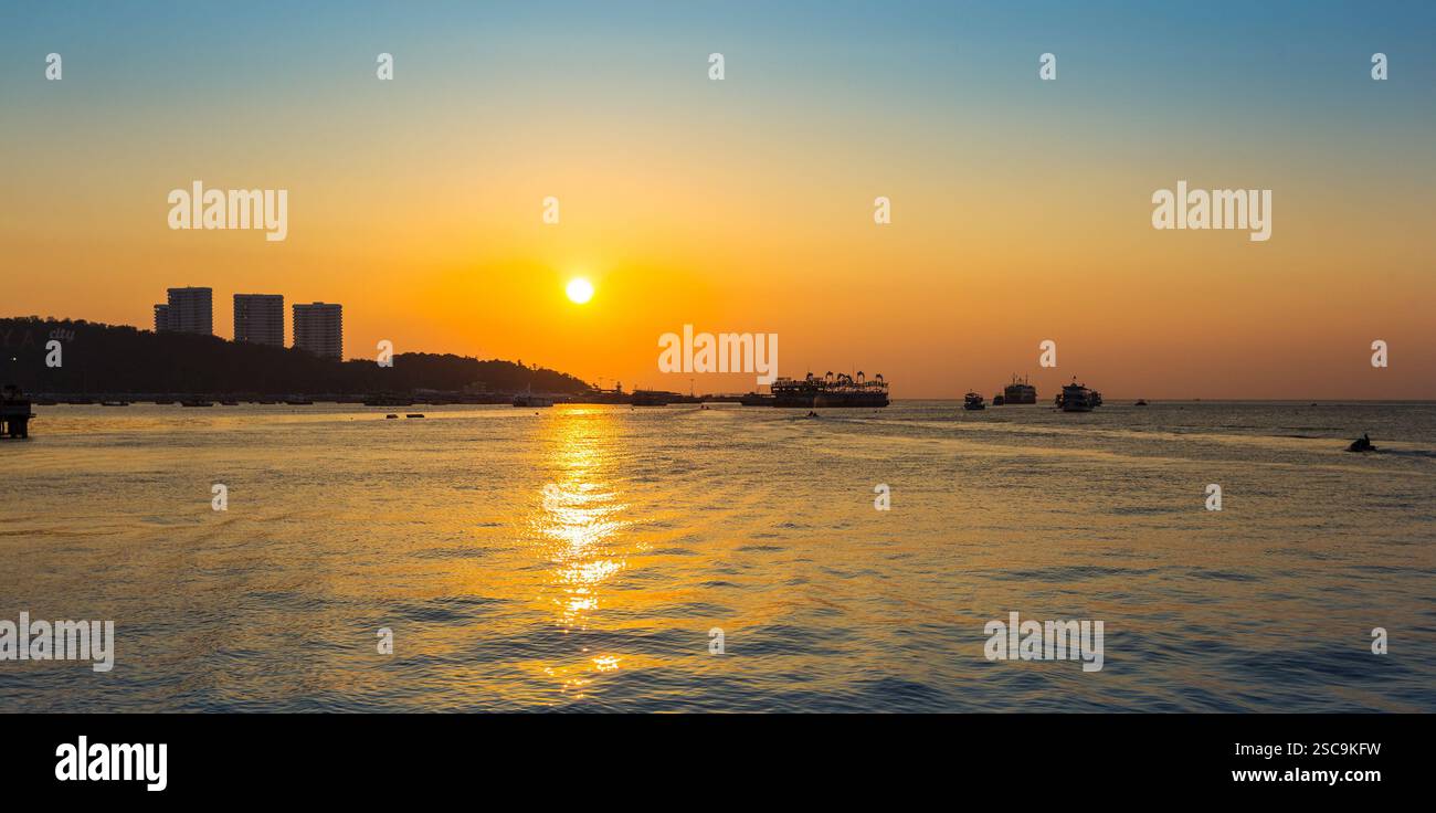The Pattaya city harbor at twilight, Thailand Stock Photo - Alamy
