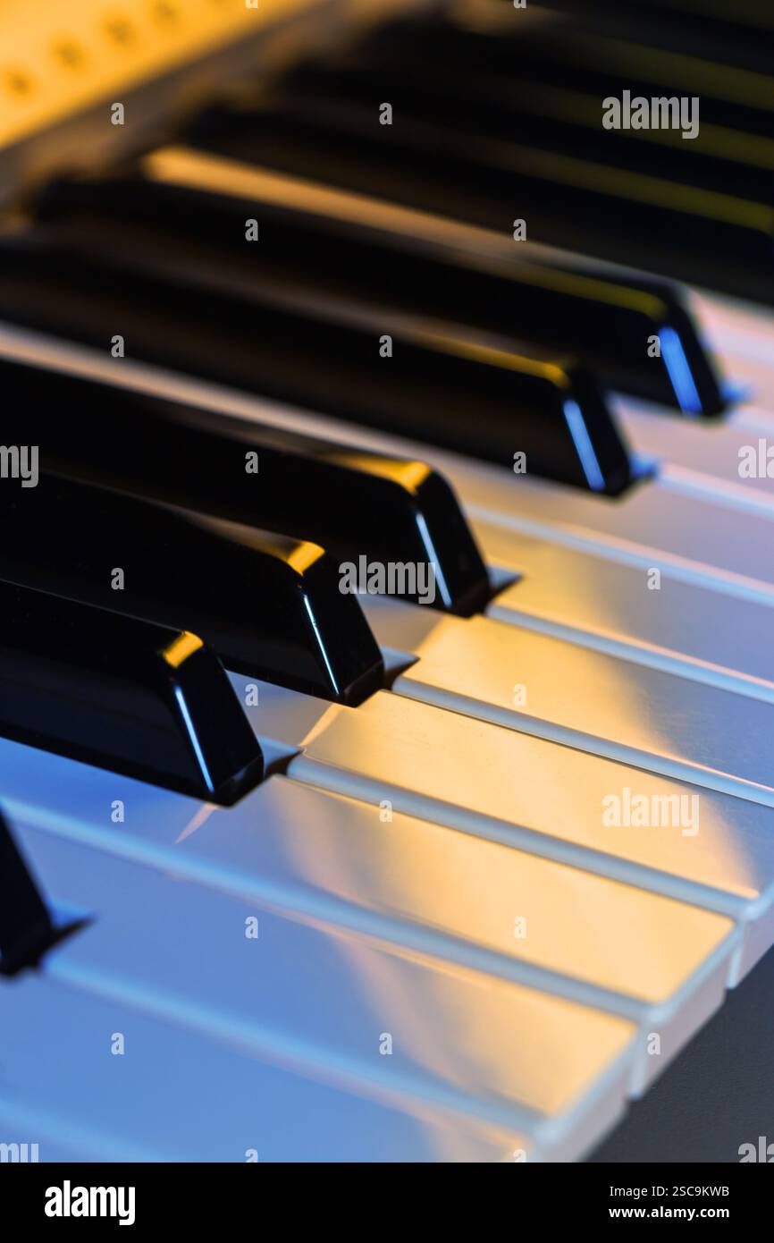 Piano keys side view with shallow depth of field Stock Photo - Alamy