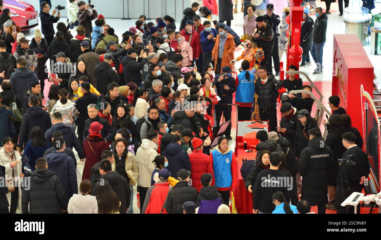 People visit an AI-themed technology temple fair in Beijing, China, 30 ...