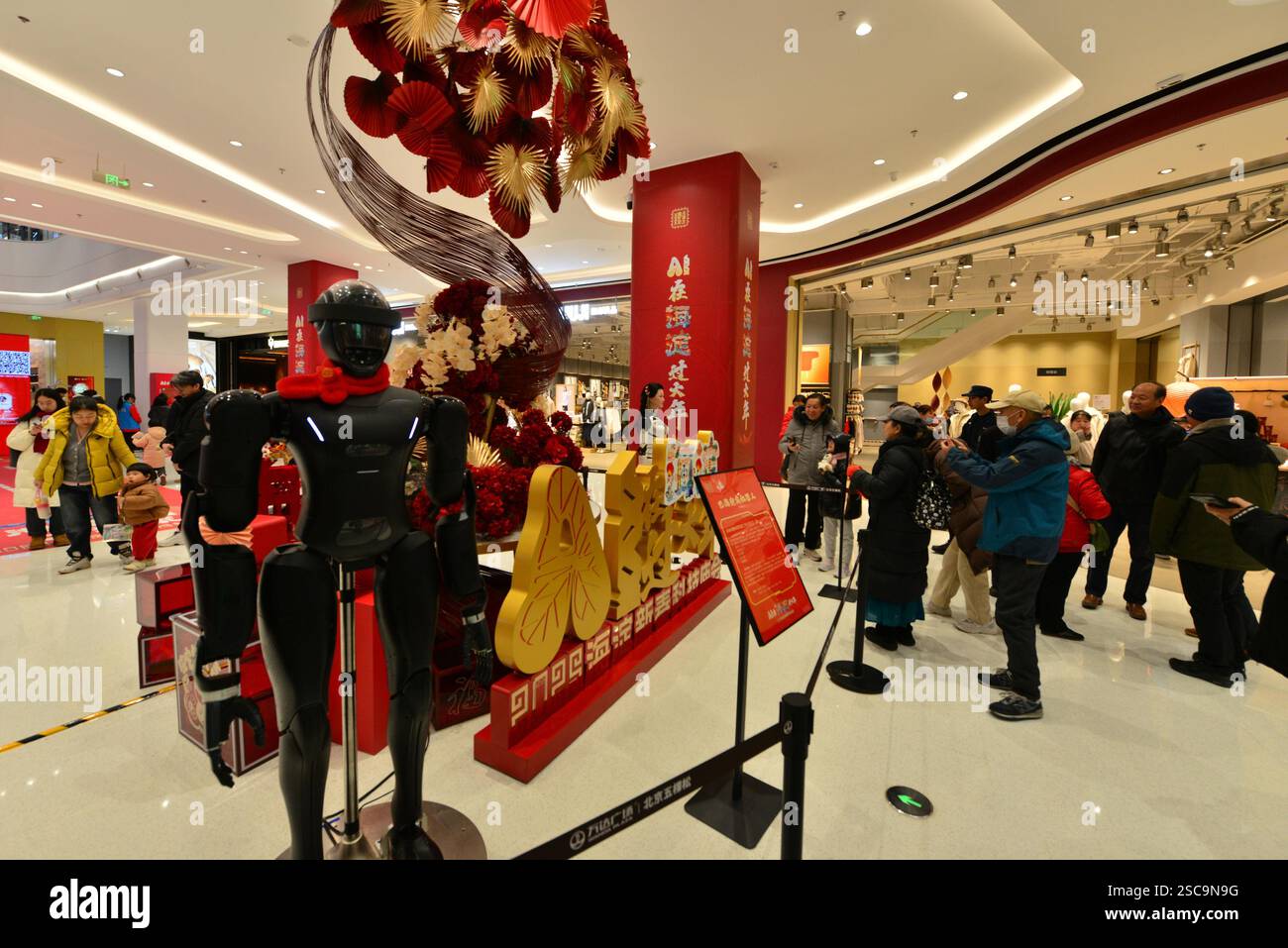People visit an AI-themed technology temple fair in Beijing, China, 30 ...