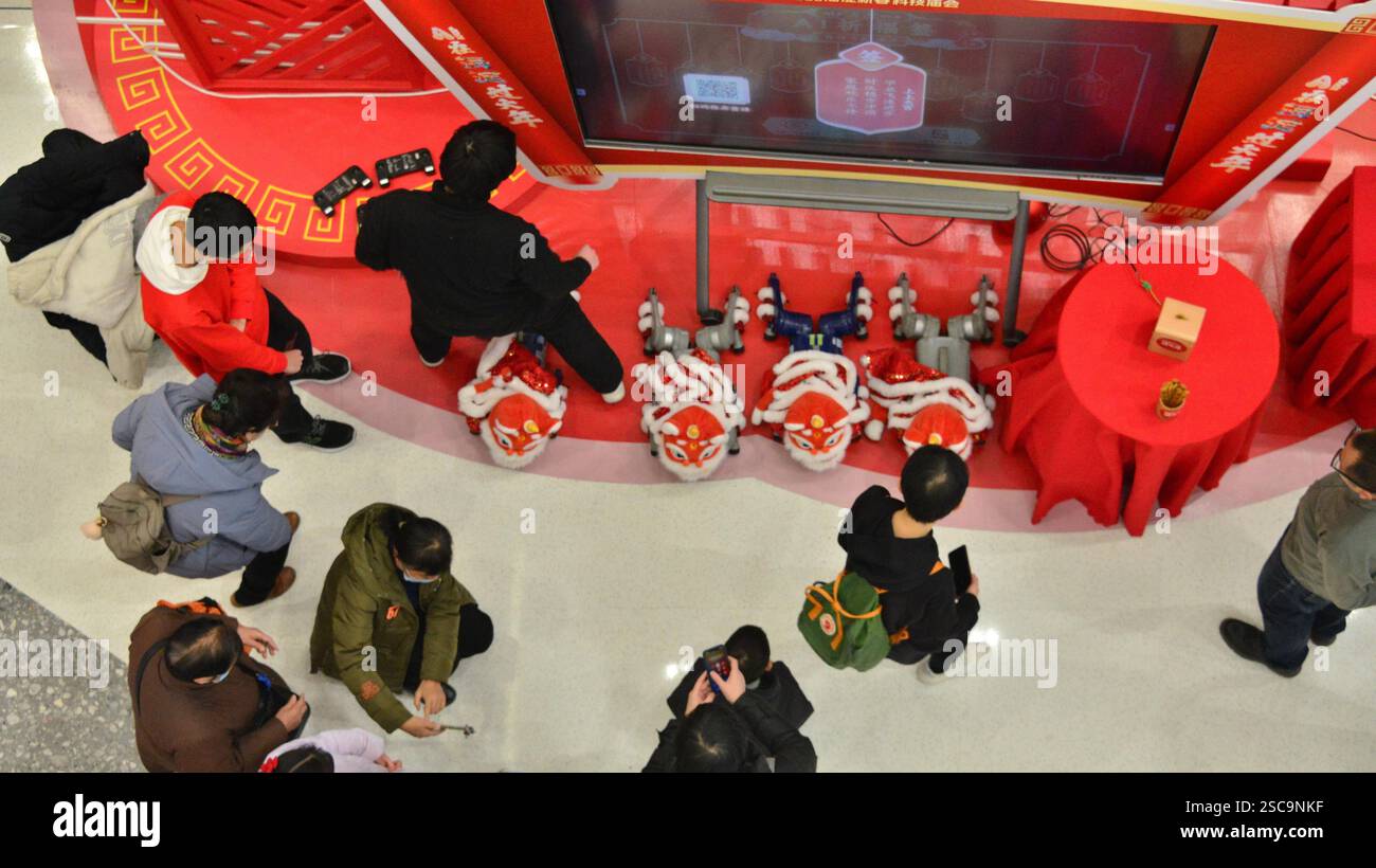 People visit an AI-themed technology temple fair in Beijing, China, 30 ...
