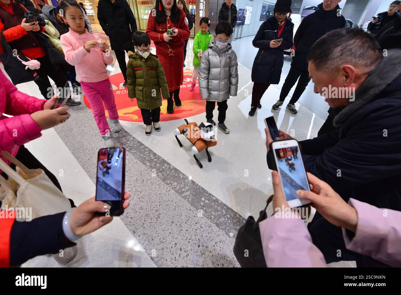 People visit an AI-themed technology temple fair in Beijing, China, 30 ...