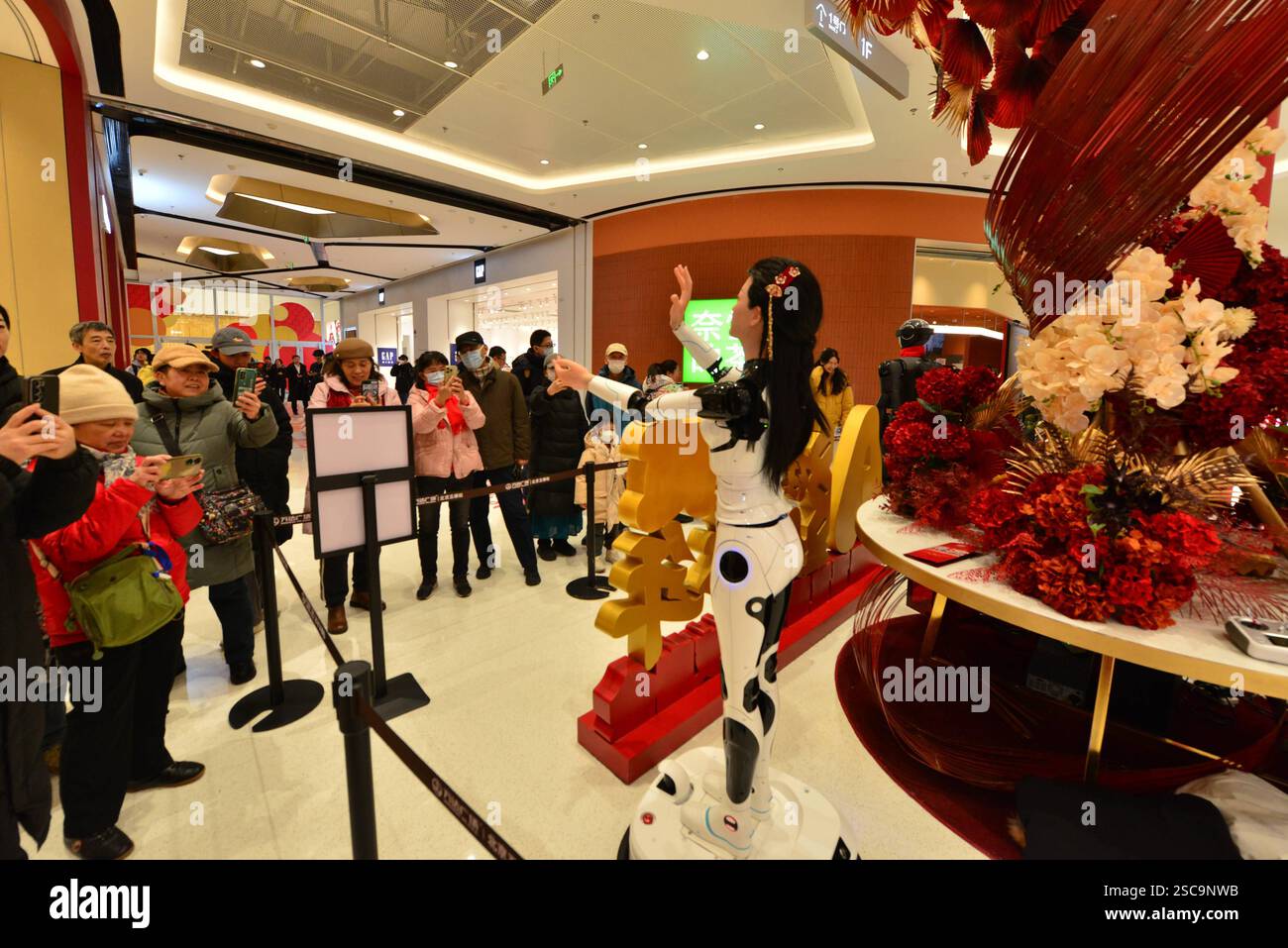 People visit an AI-themed technology temple fair in Beijing, China, 30 ...