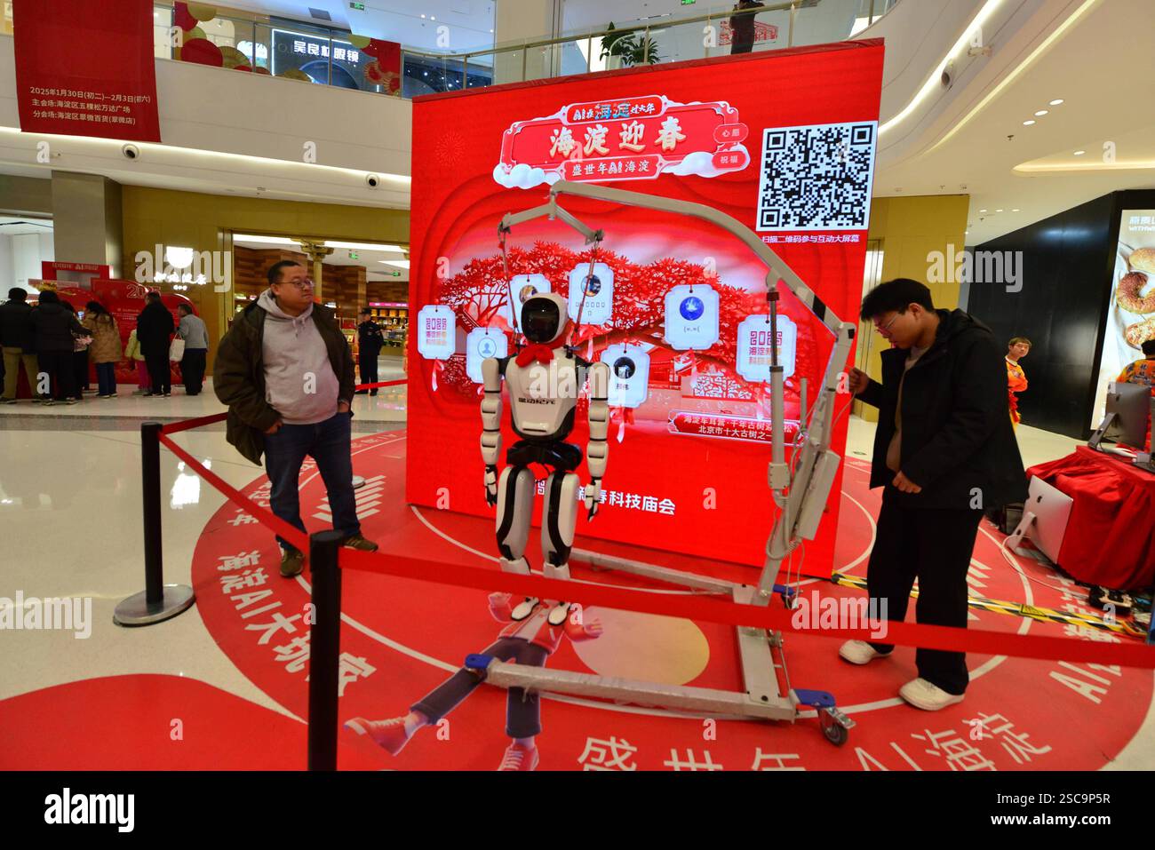 People visit an AI-themed technology temple fair in Beijing, China, 30 ...