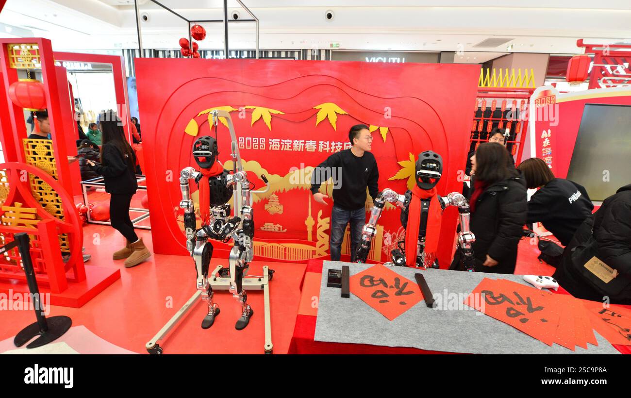 People visit an AI-themed technology temple fair in Beijing, China, 30 ...