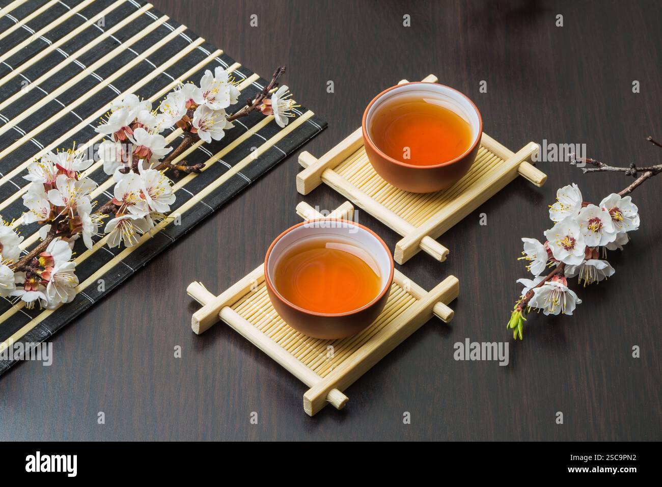 Ancient Chinese tea set with spring flowers Stock Photo - Alamy