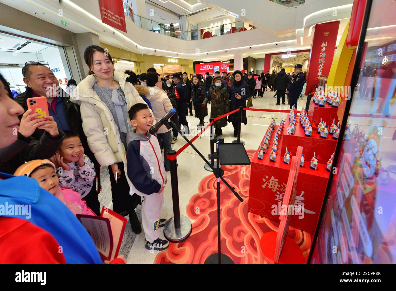 People visit an AI-themed technology temple fair in Beijing, China, 30 ...