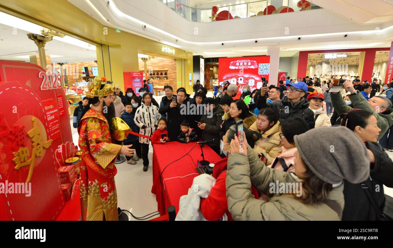People visit an AI-themed technology temple fair in Beijing, China, 30 ...