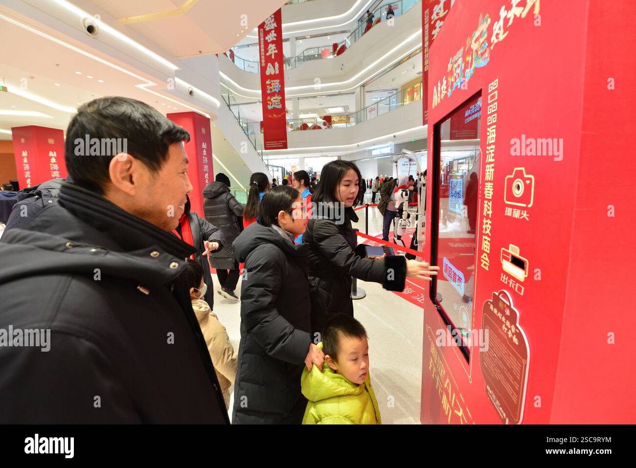 People visit an AI-themed technology temple fair in Beijing, China, 30 ...