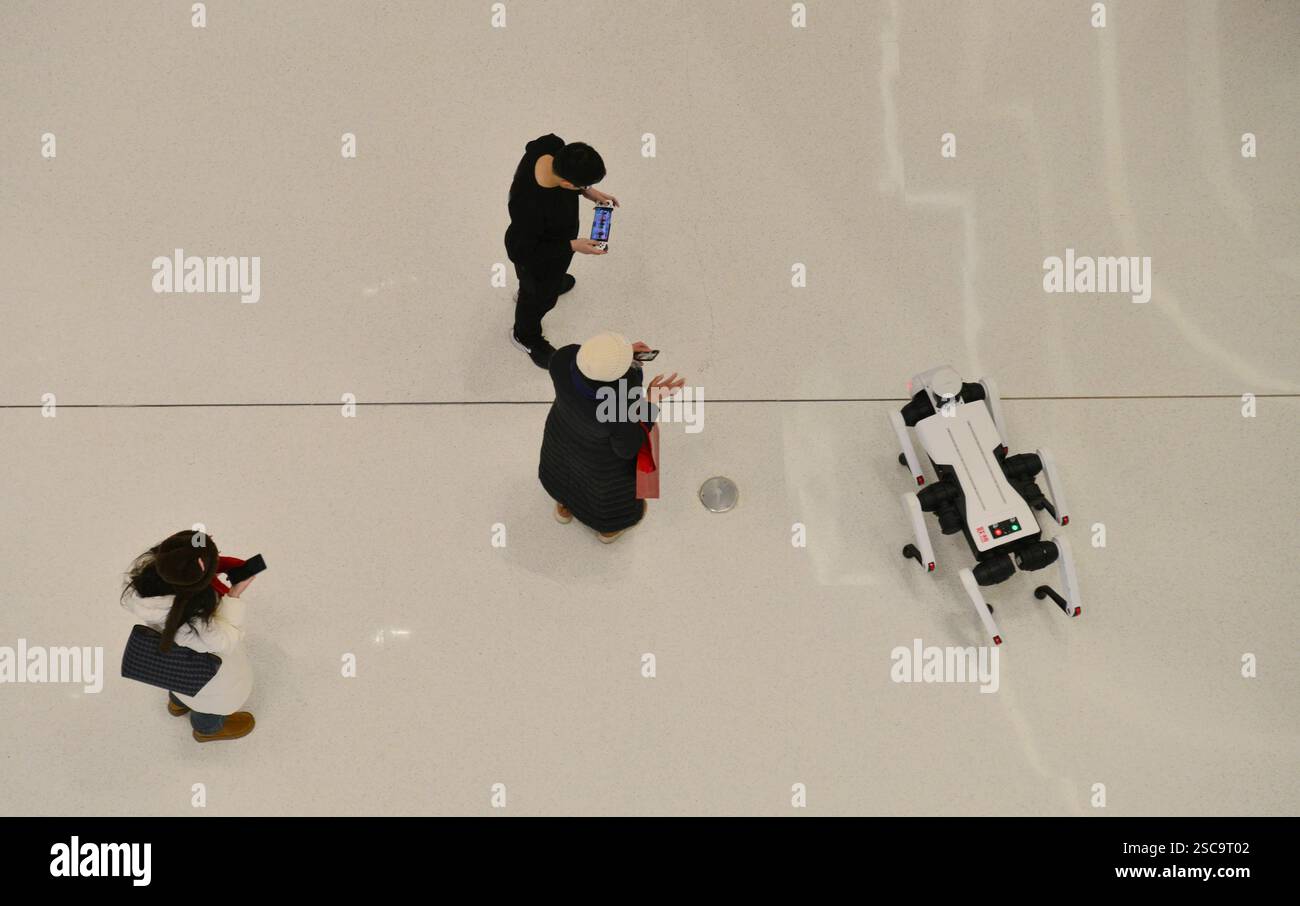 People visit an AI-themed technology temple fair in Beijing, China, 30 ...