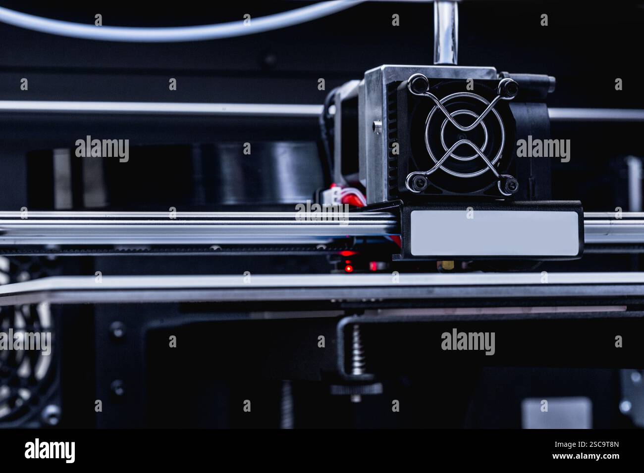 3d printer with bright red filament Stock Photo - Alamy