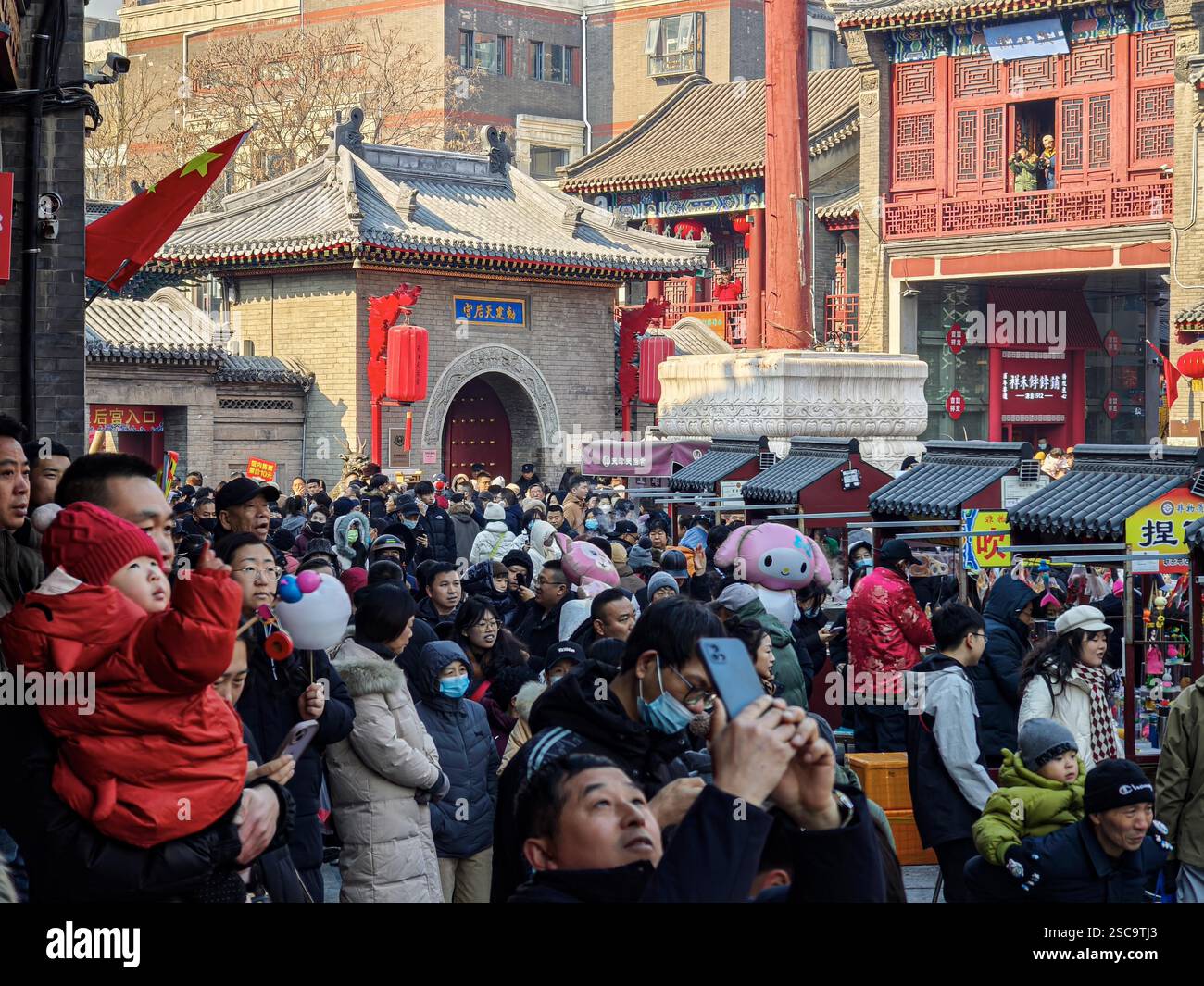 People stroll in the ancient block to celebrate the Spring Festival in ...