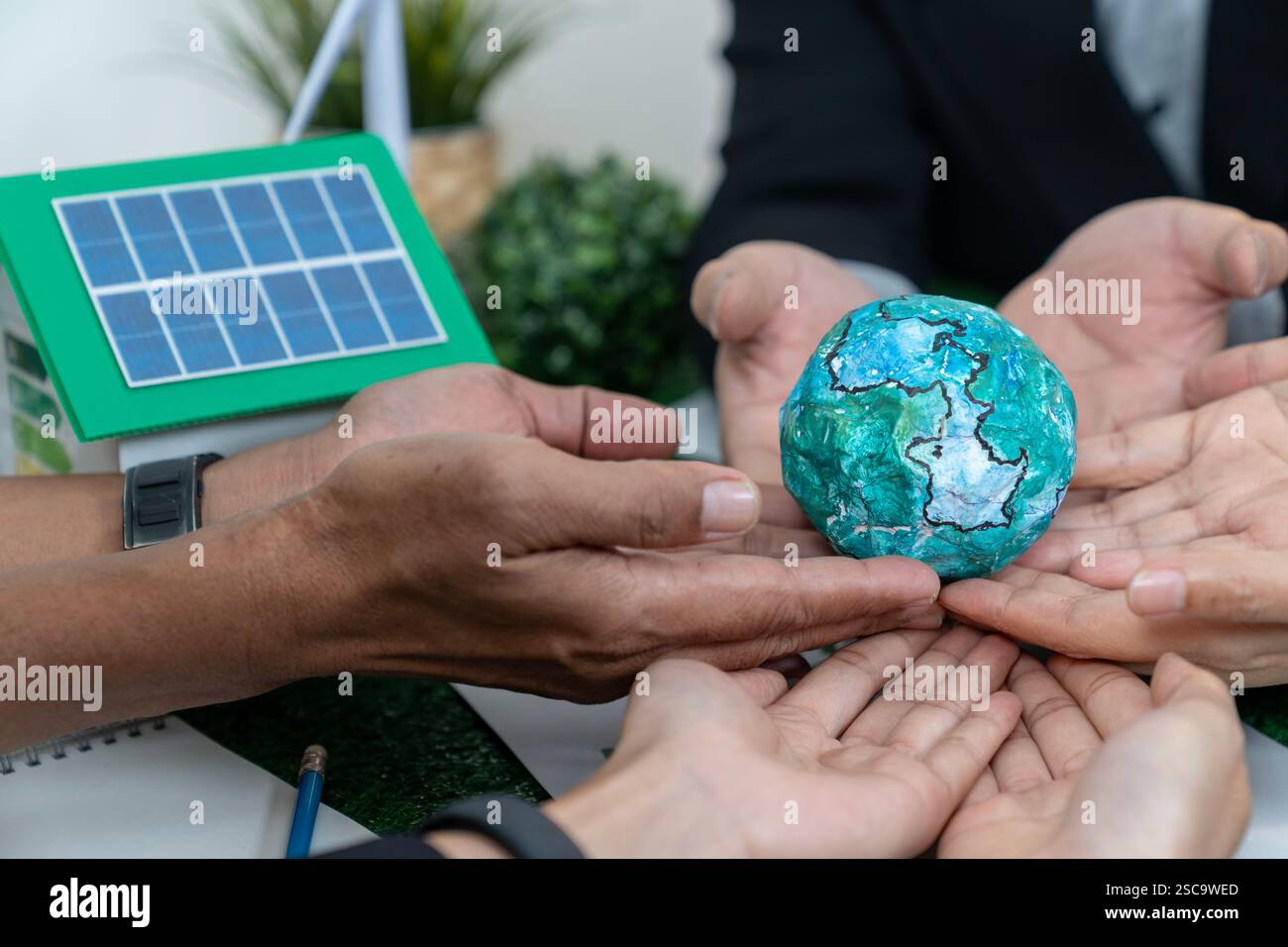 Hands business Team Work Cupping young Plant Nurture Environmental and reduce global warming ...