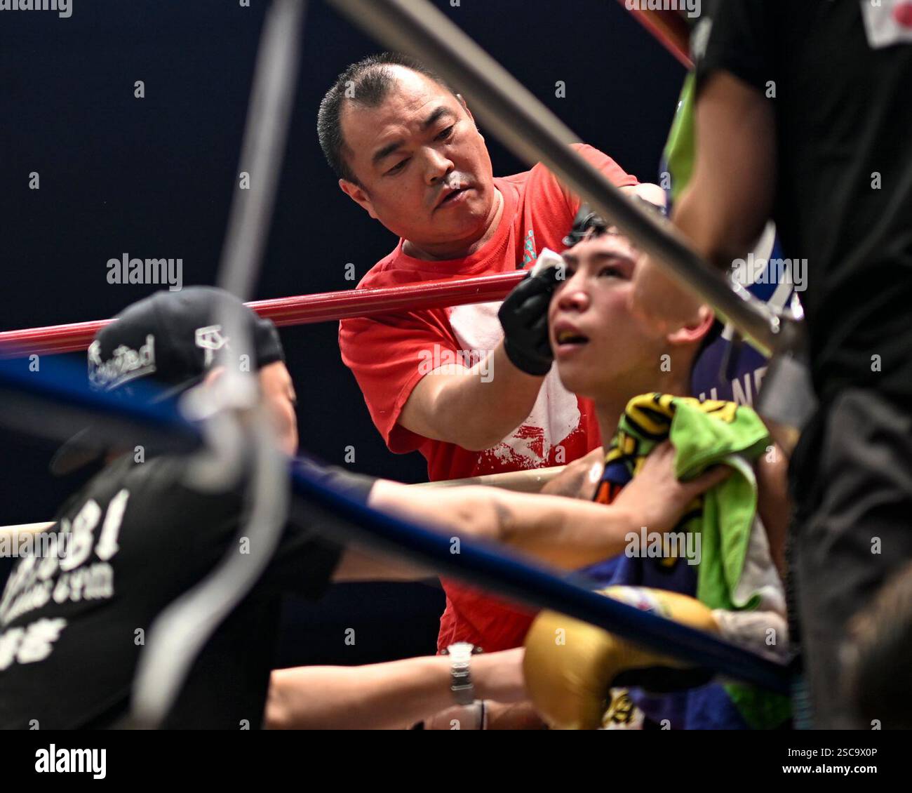 Tokyo, Japan. 18th Jan, 2025. Japan's Jukiya Iimura, right, receives ...