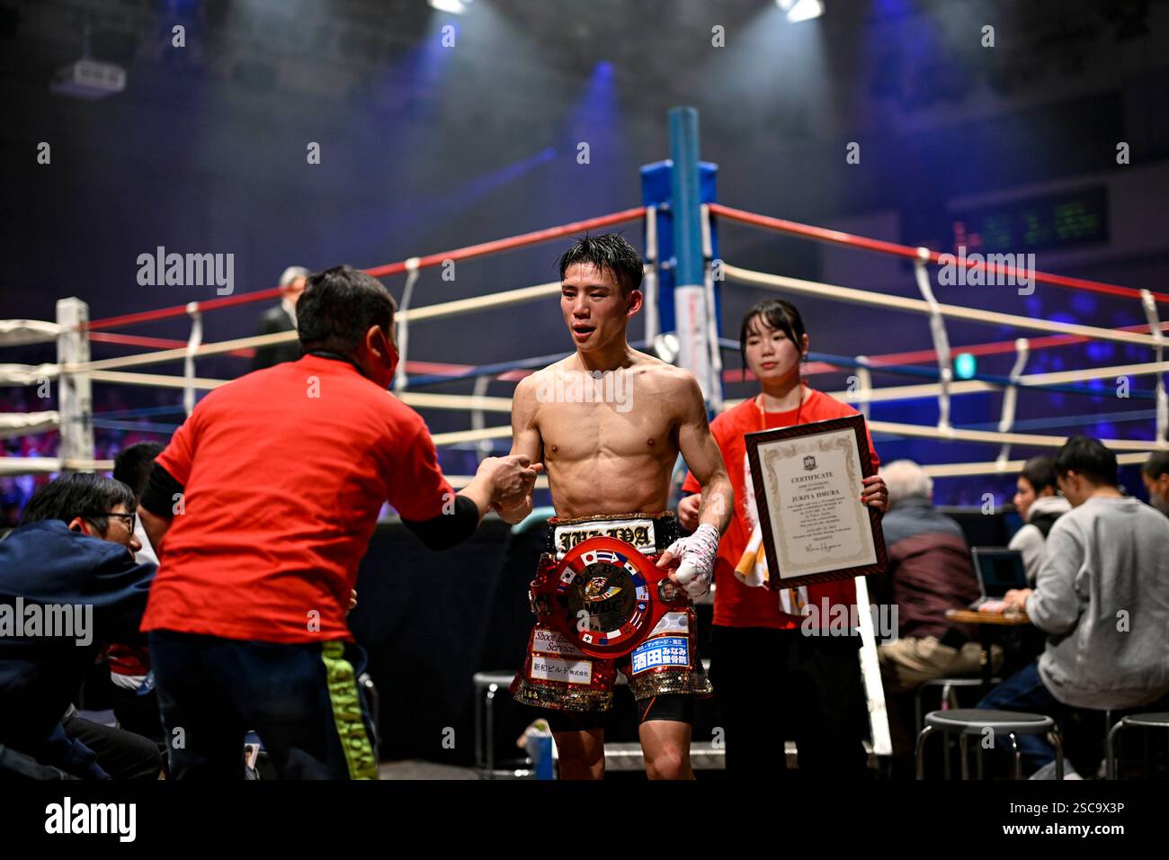 Tokyo, Japan. 18th Jan, 2025. Japan's Jukiya Iimura leaves the ring with his wife Manami after ...