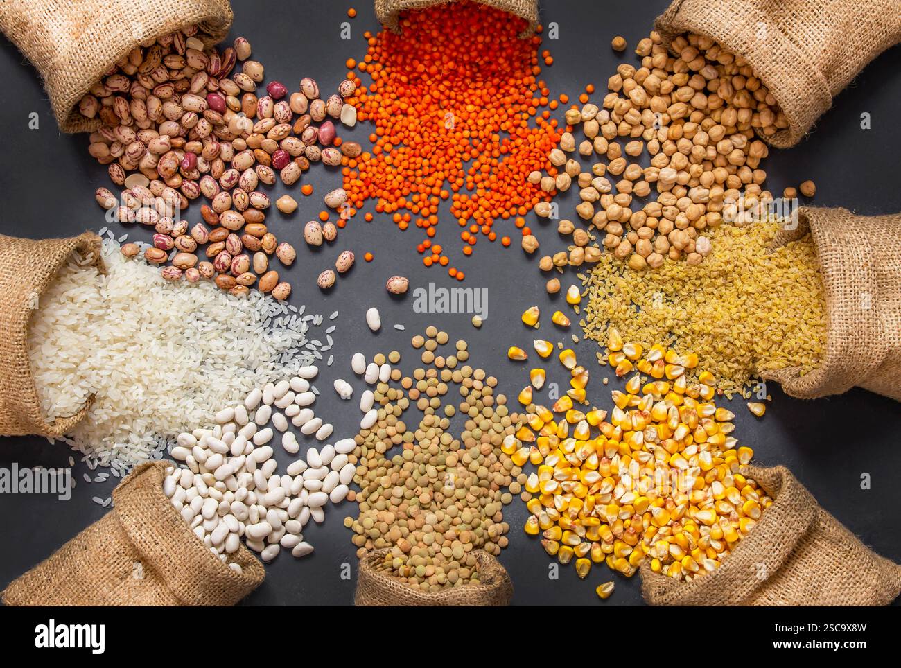 Different type of raw dry legumes composition. White beans, lentils ...