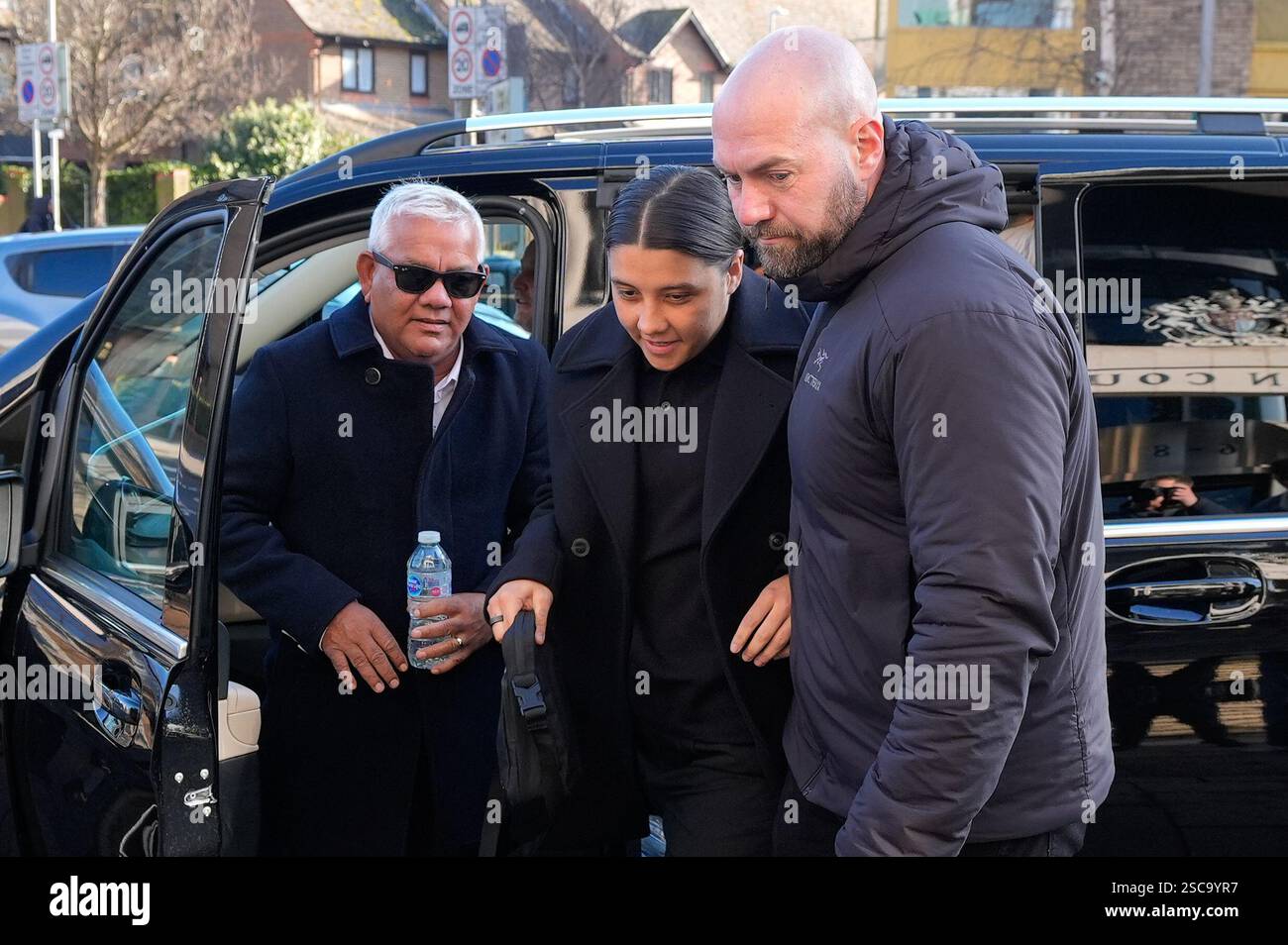 Chelsea and Australia striker Sam Kerr (centre) arrives with her father ...