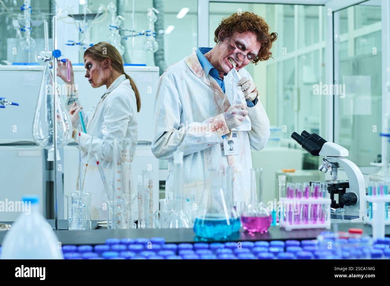 Clueless Undead Technicians in Laboratory Stock Photo - Alamy